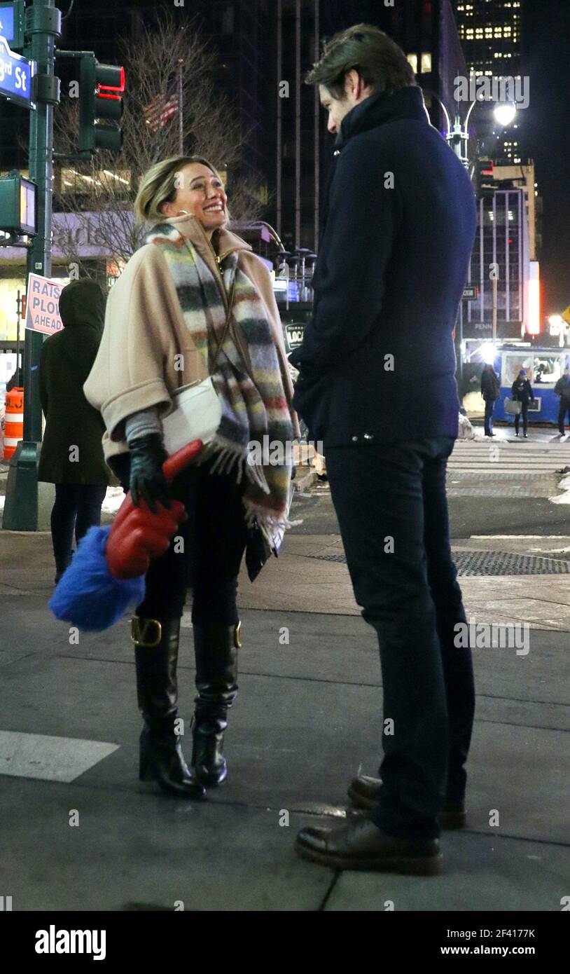 New York - NY - 20210211 Hilary Duff and Steven Good share a kiss while ...