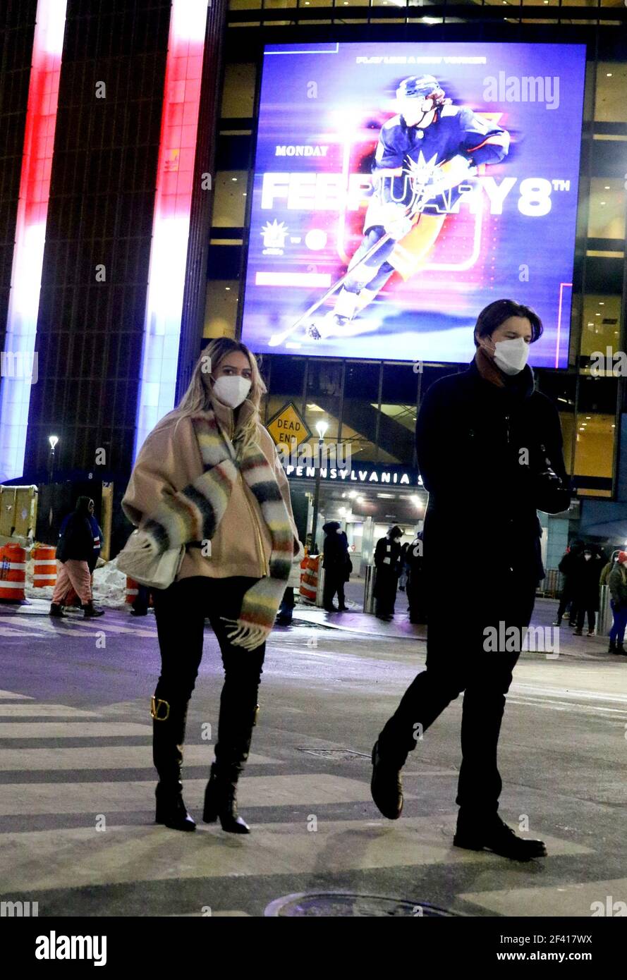 New York - NY - 20210211 Hilary Duff and Steven Good share a kiss while ...