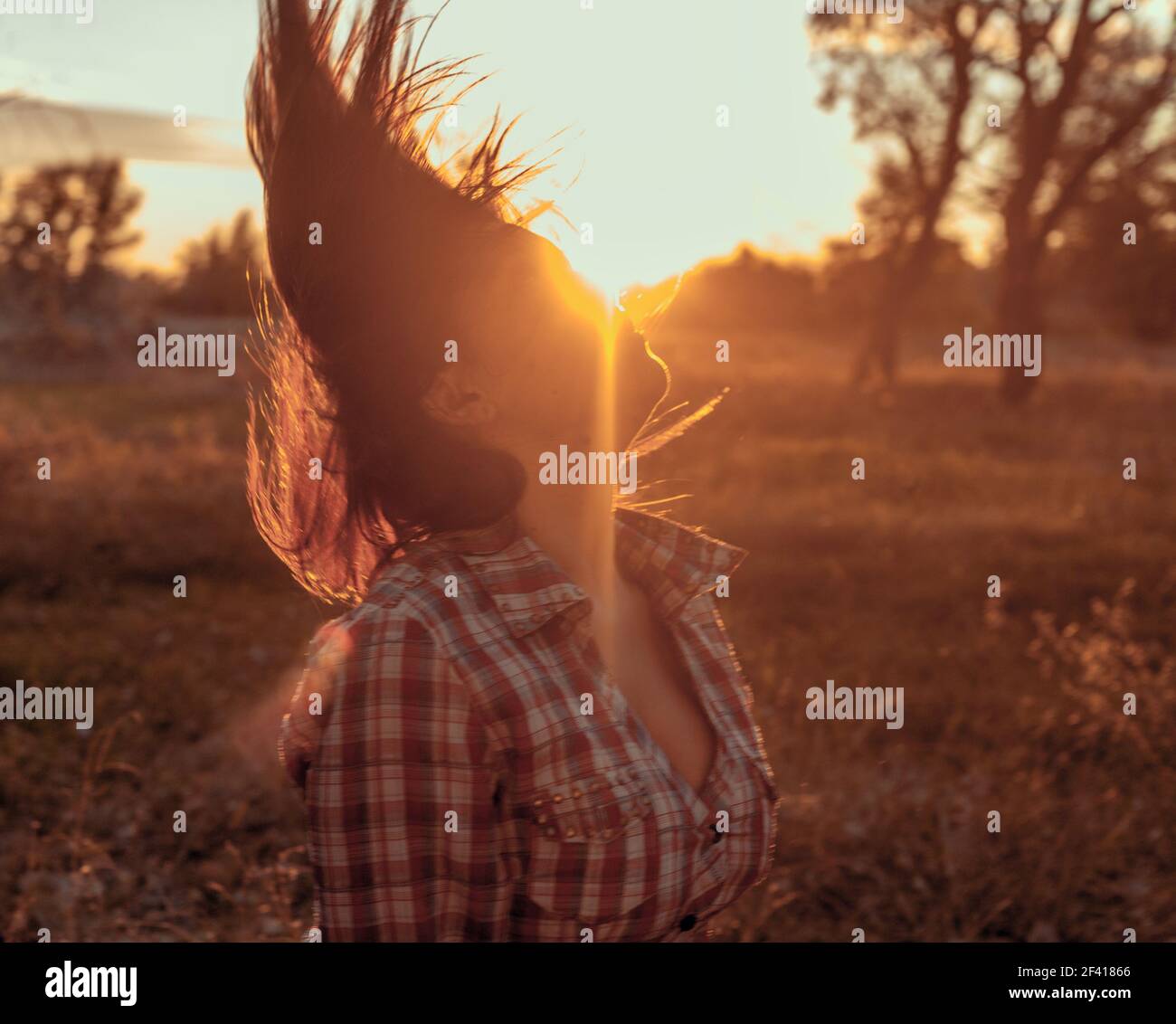 Shaking hair in sunlight hi-res stock photography and images - Alamy