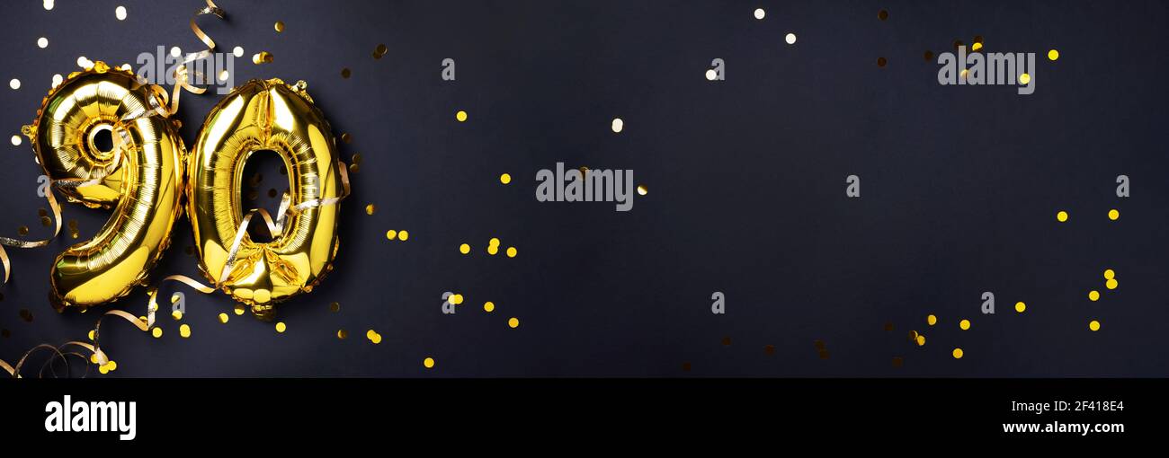 Gold foil balloon number, digit ninety. Birthday greeting card with inscription 90. Anniversary ...