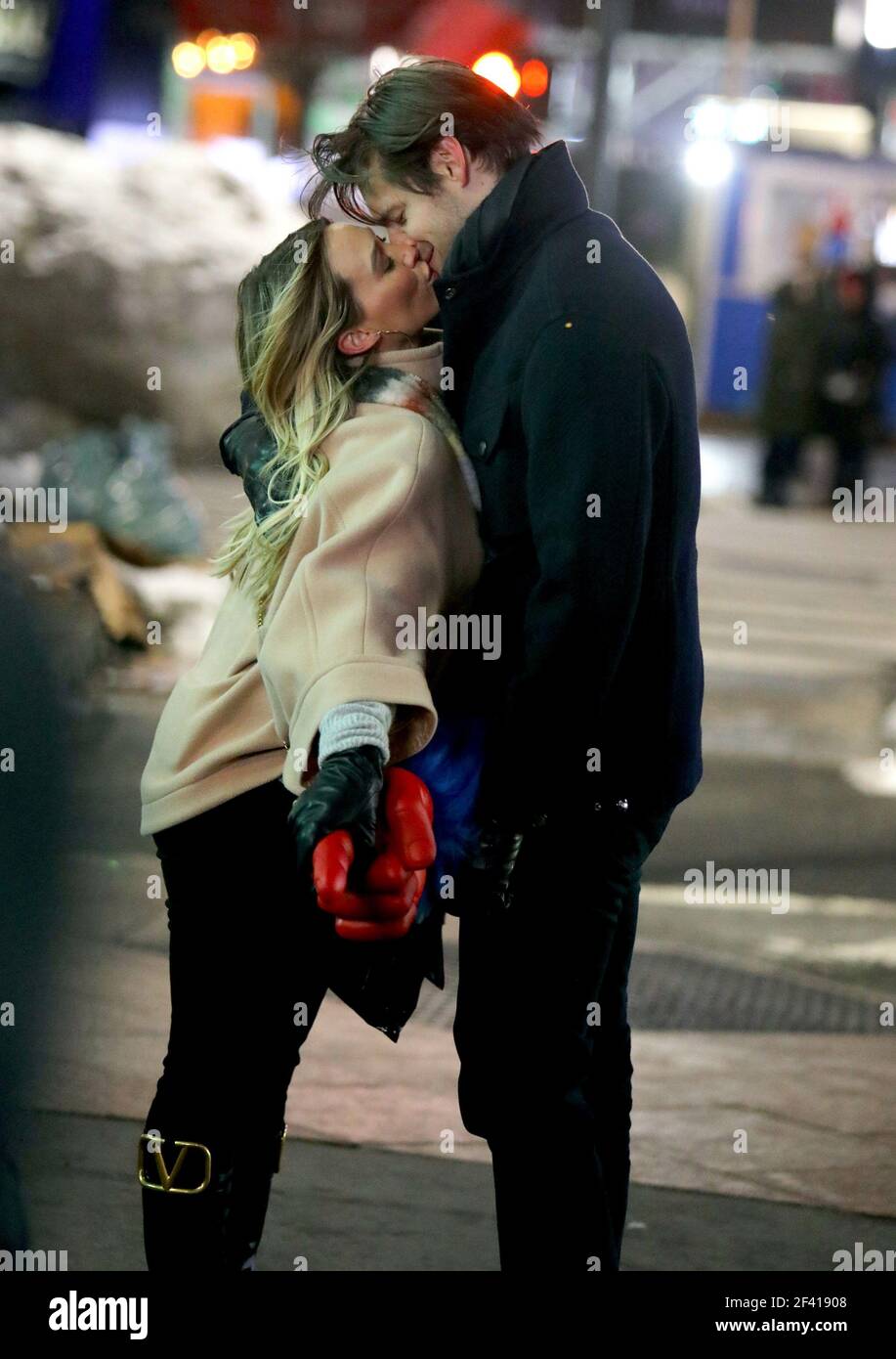 New York - NY - 20210211 Hilary Duff and Steven Good share a kiss while ...