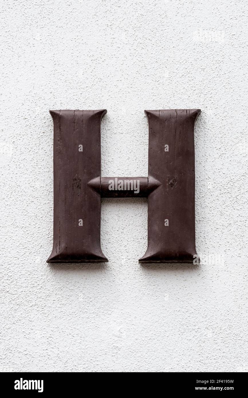 Brown wooden letter H Stock Photo - Alamy