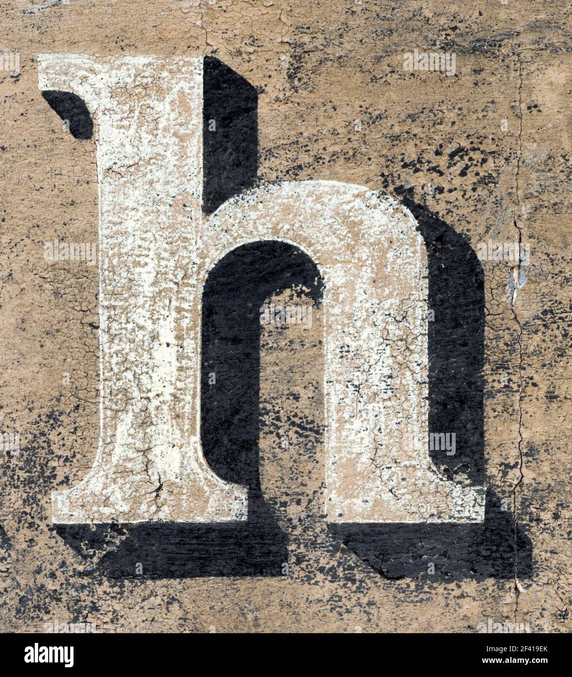 Dissolving letter h of a historical advertising font Stock Photo - Alamy