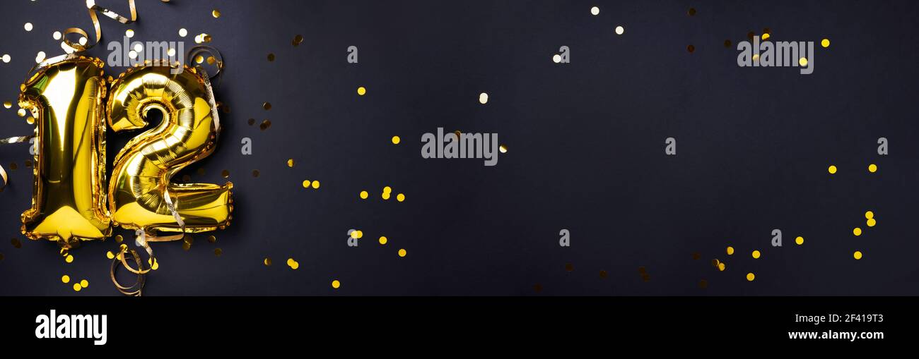 Gold foil balloon number, digit twelve. Birthday greeting card ...