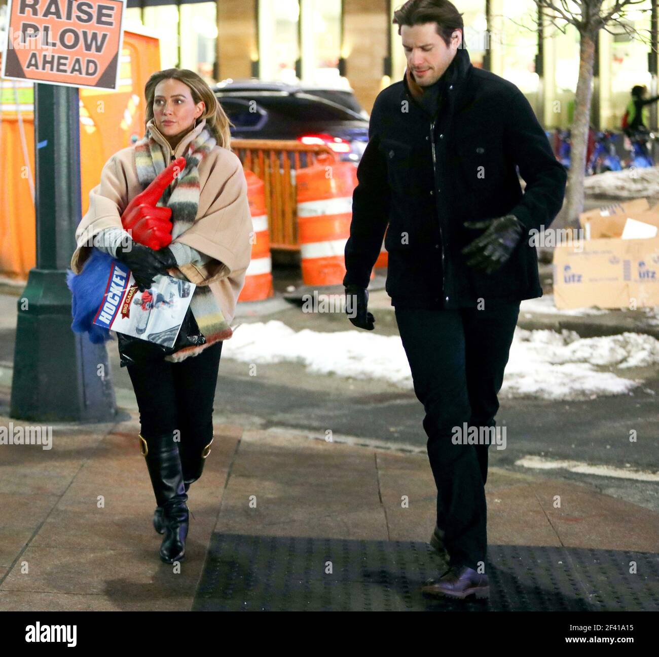 New York - NY - 20210211 Hilary Duff and Steven Good share a kiss while ...