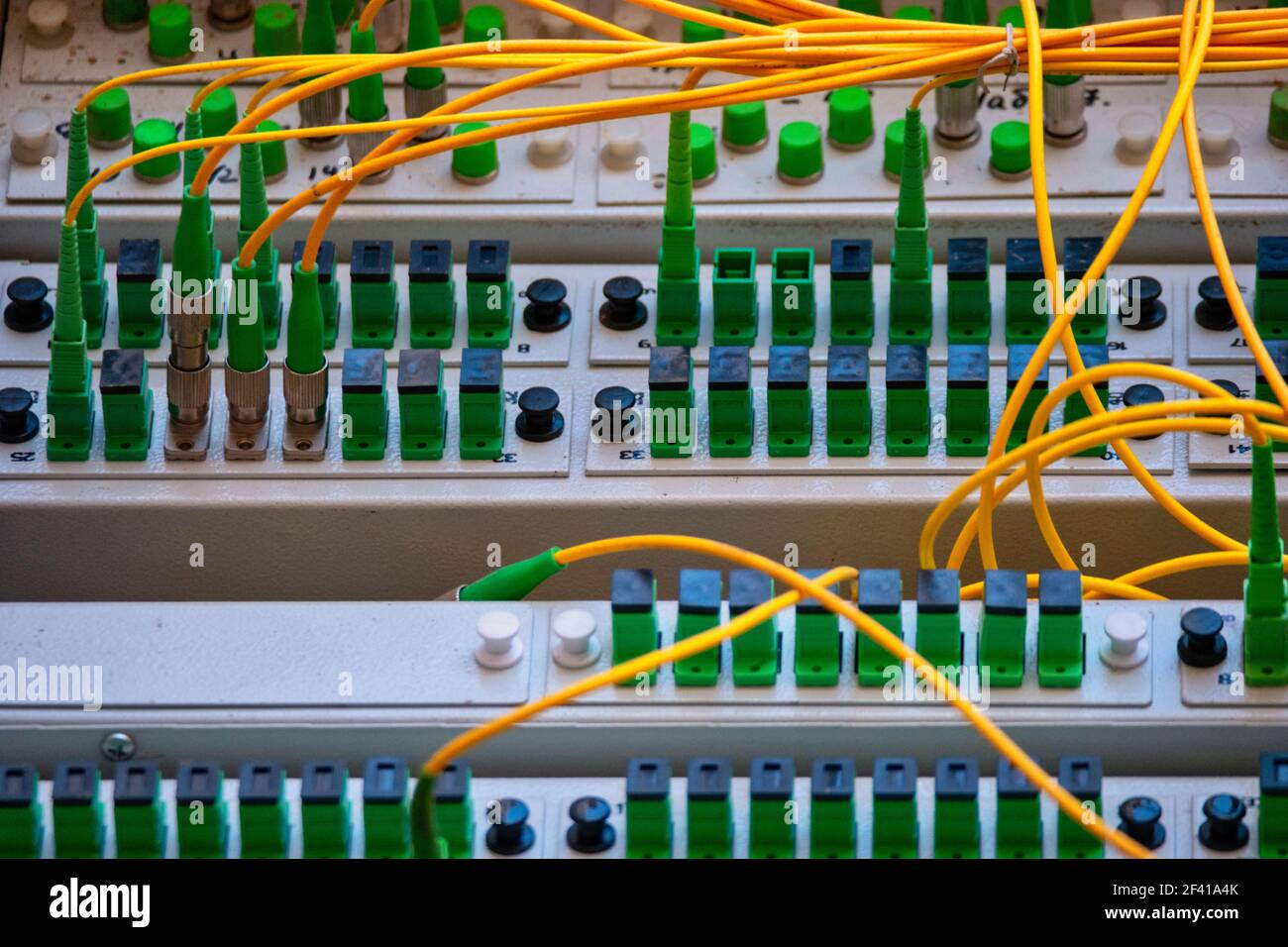 Fiber optic Patch Panel Open With Some Patch Cords Connected. Fiber ...