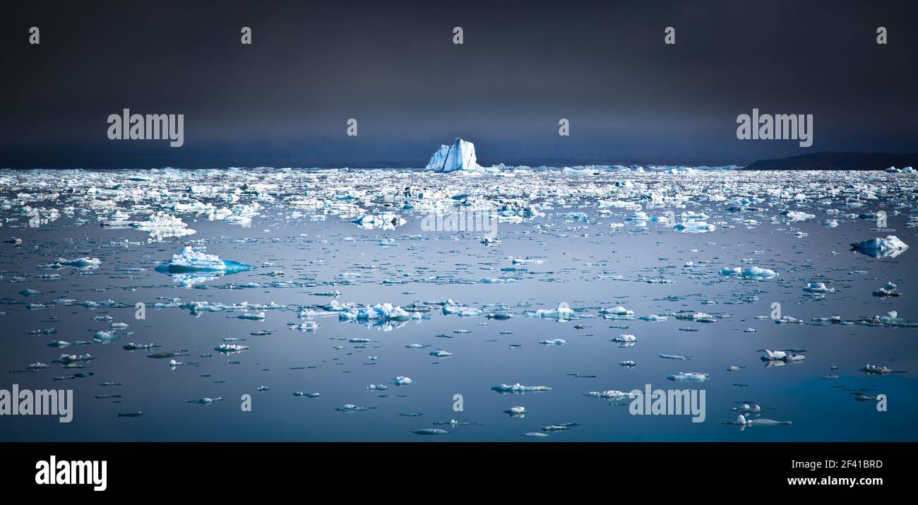 A breathtaking view of icebergs and sea ice floating in the water Stock ...