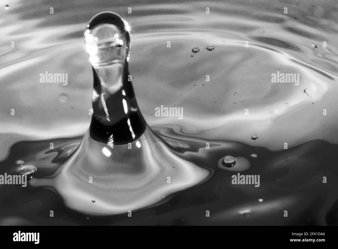 Colored water drop, circle ripples, splash of water, closeup Stock ...