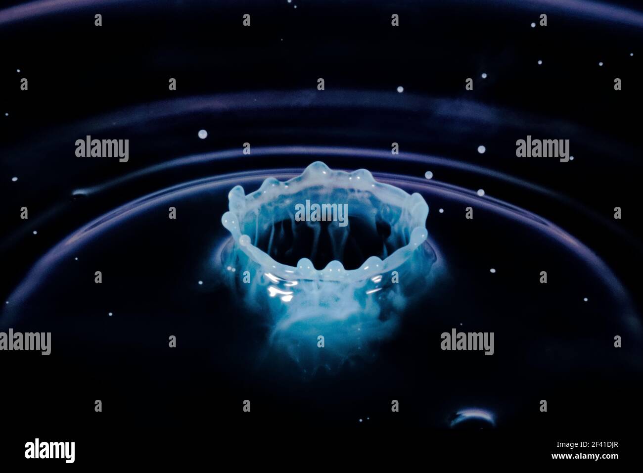 Colored water drop, circle ripples, splash of water, closeup Stock ...