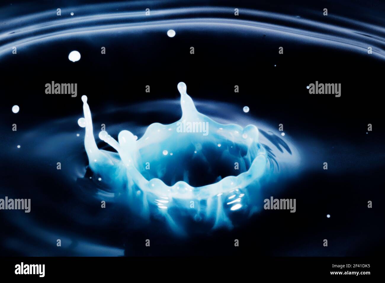 Colored water drop, circle ripples, splash of water, closeup Stock ...