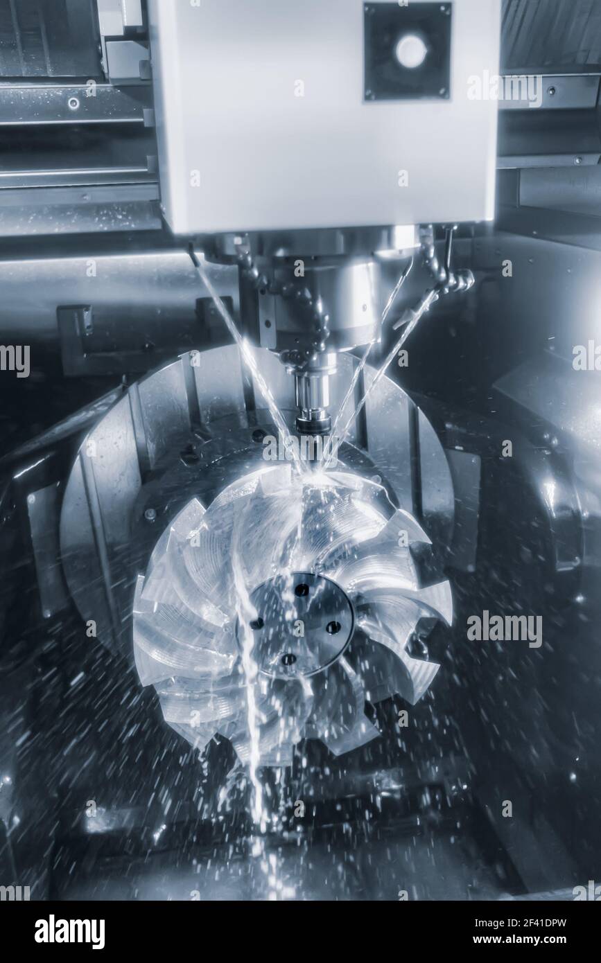 Metalworking CNC lathe milling machine. Cutting metal modern processing technology. Milling is ...