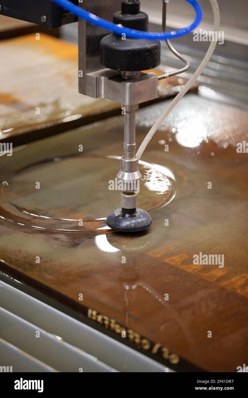 CNC water jet cutting machine modern industrial technology Stock Photo ...