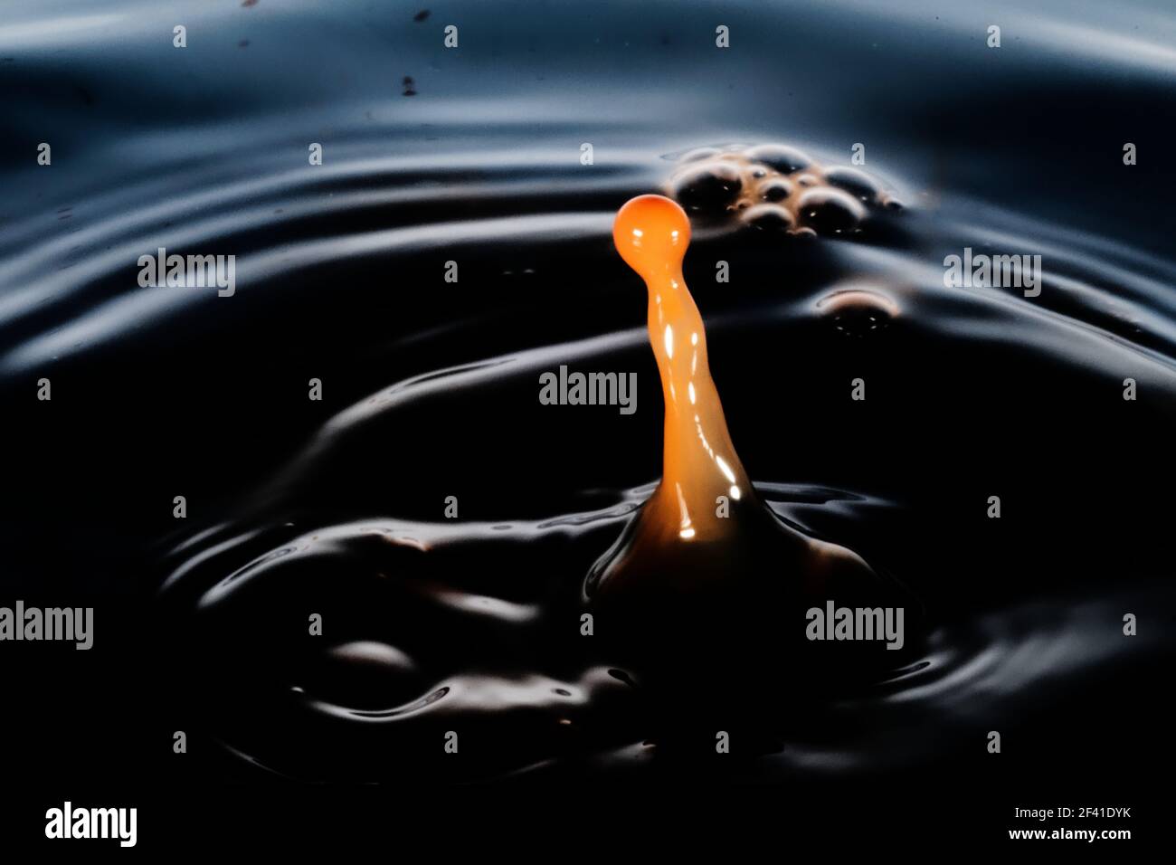 Colored water drop, circle ripples, splash of water, closeup Stock ...