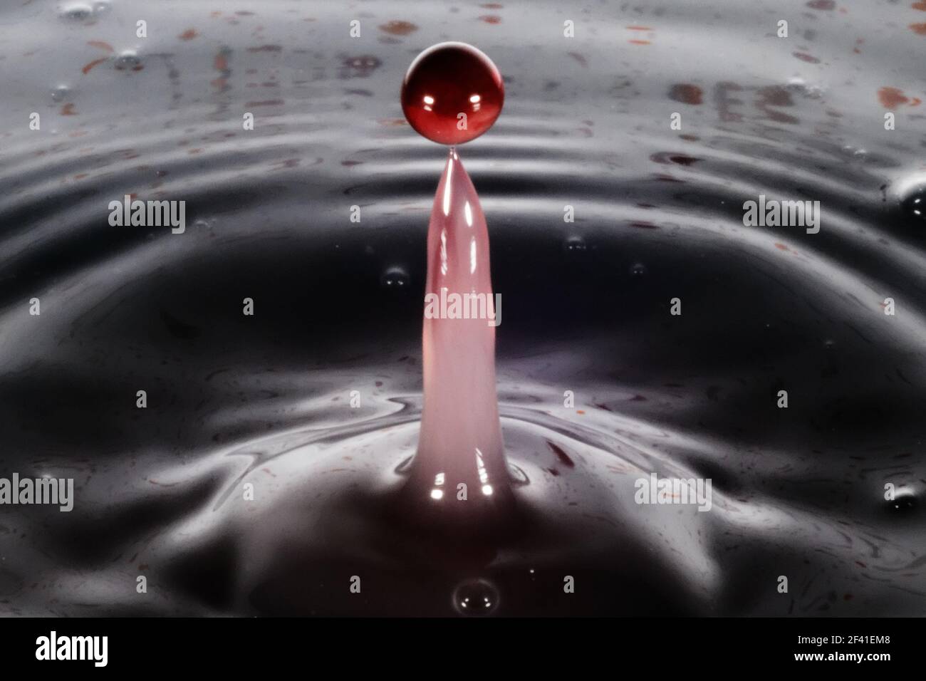 Colored water drop, circle ripples, splash of water, closeup Stock ...