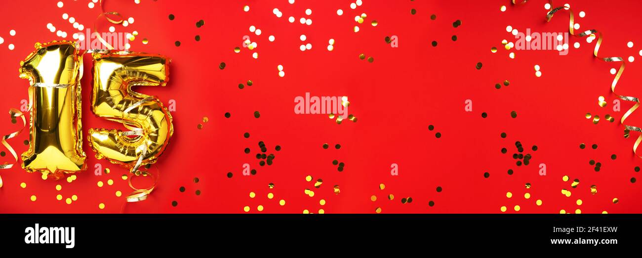 Gold foil balloon number, digit fifteen. Birthday greeting card ...