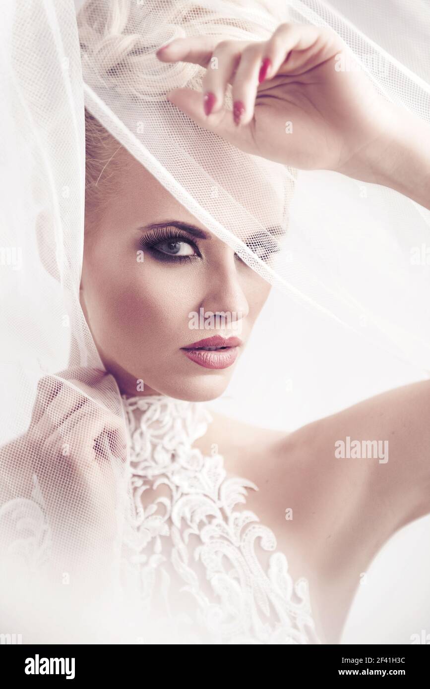 High key portrait of an elegant blonde Stock Photo - Alamy
