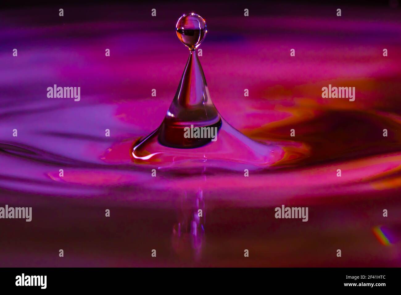 Colored water drop, circle ripples, splash of water, closeup Stock ...