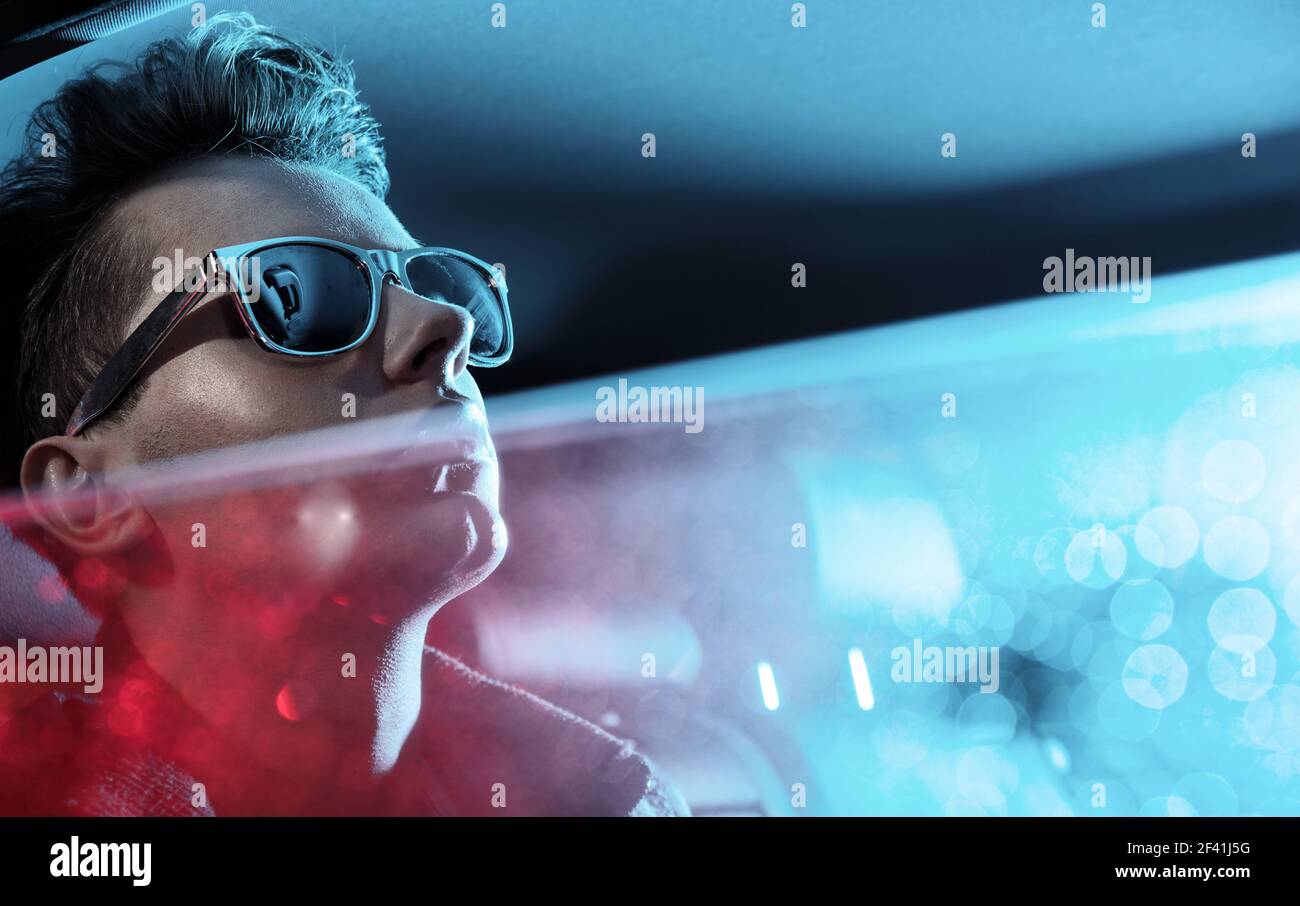 Portrait of a young guy looking behind the window Stock Photo - Alamy