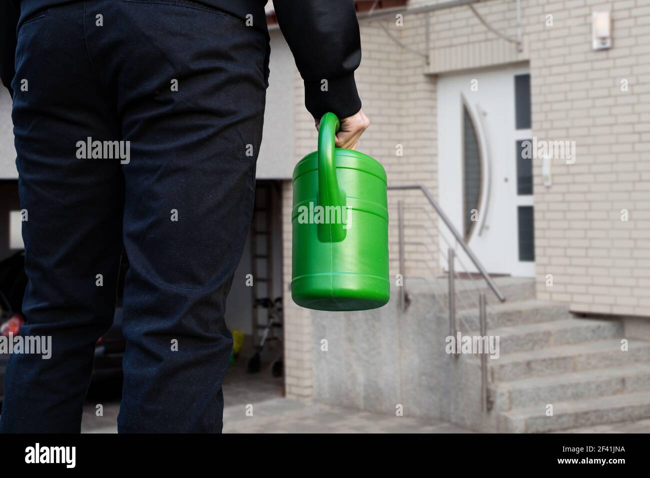 Arsonist Criminal Is About To Set House On Fire Stock Photo - Alamy