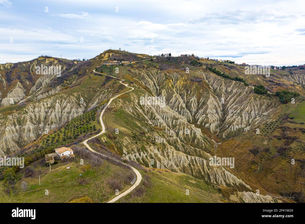 drone shot shows essence of Calanchi di Atri in Italy, highlighting a ...