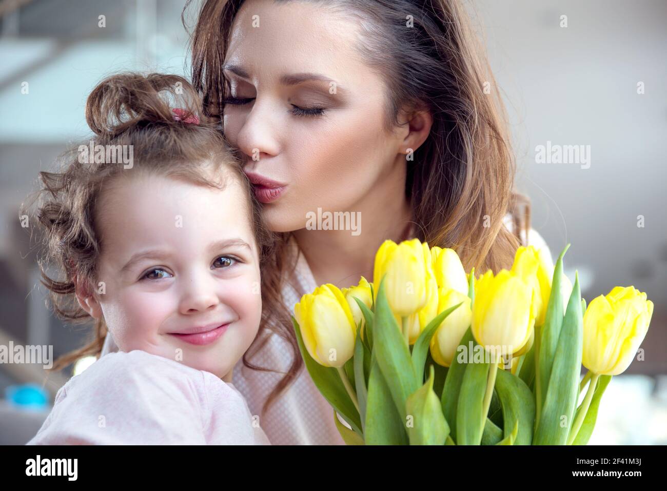 Portrait of pretty mother with a beloved daughter Stock Photo - Alamy