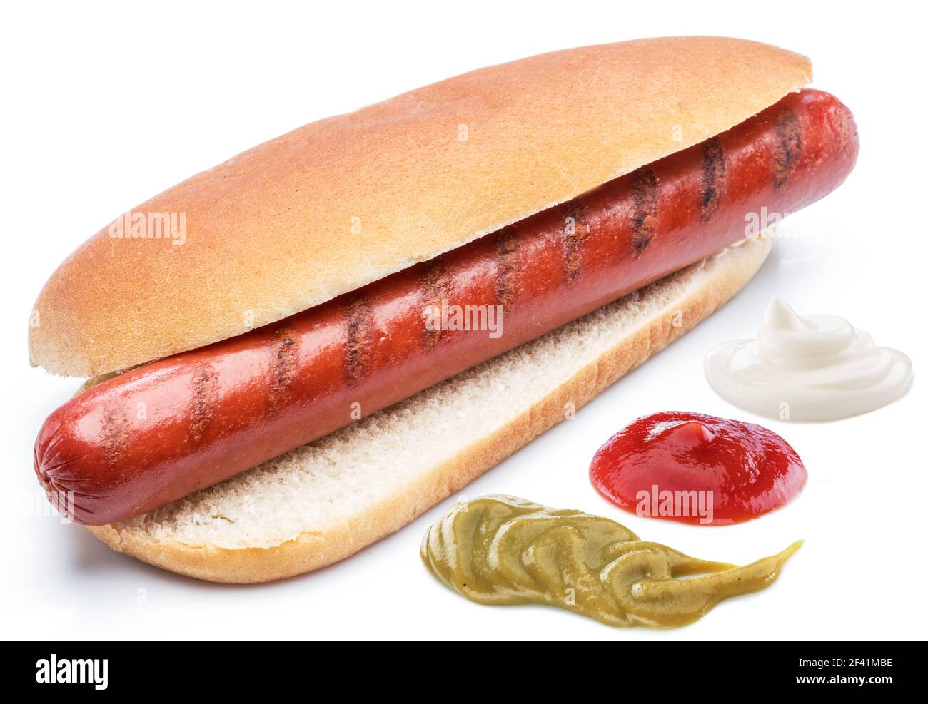 Hot dog - grilled sausage in a bun with sauces - ketchup, mayonnaise ...