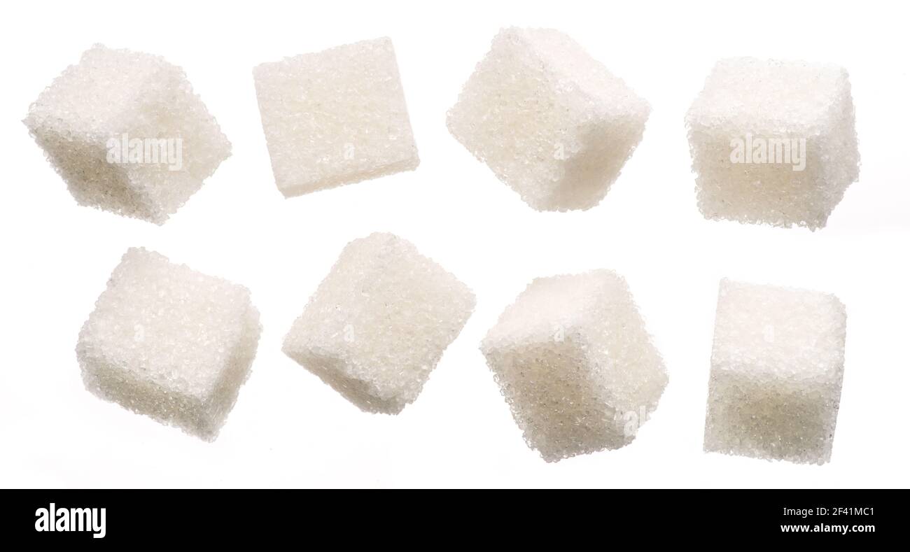 White sugar cubes on white background. Macro picture Stock Photo - Alamy