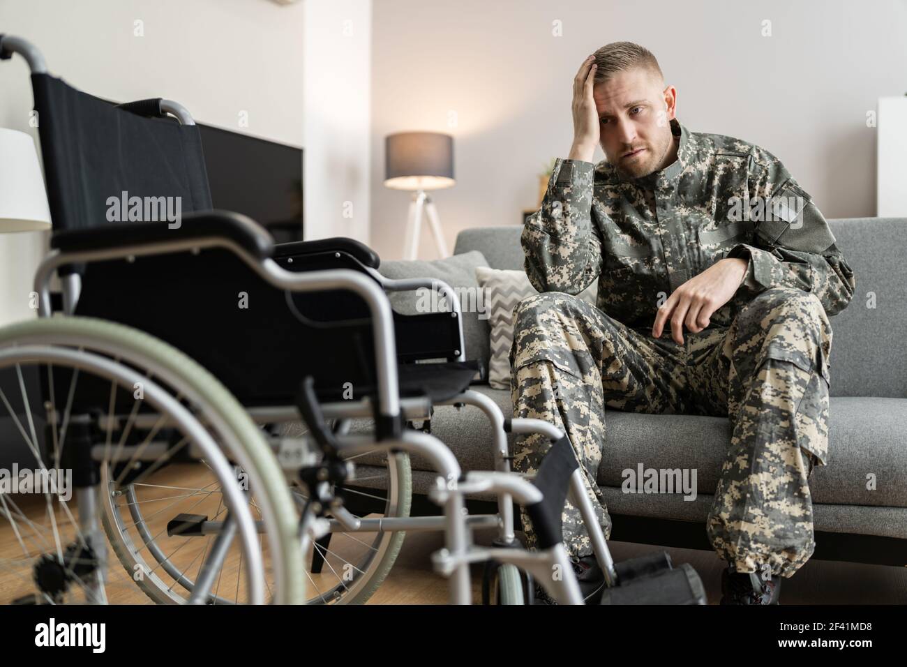 Disabled Military Soldier In Wheelchair With PTSD After Injury And ...
