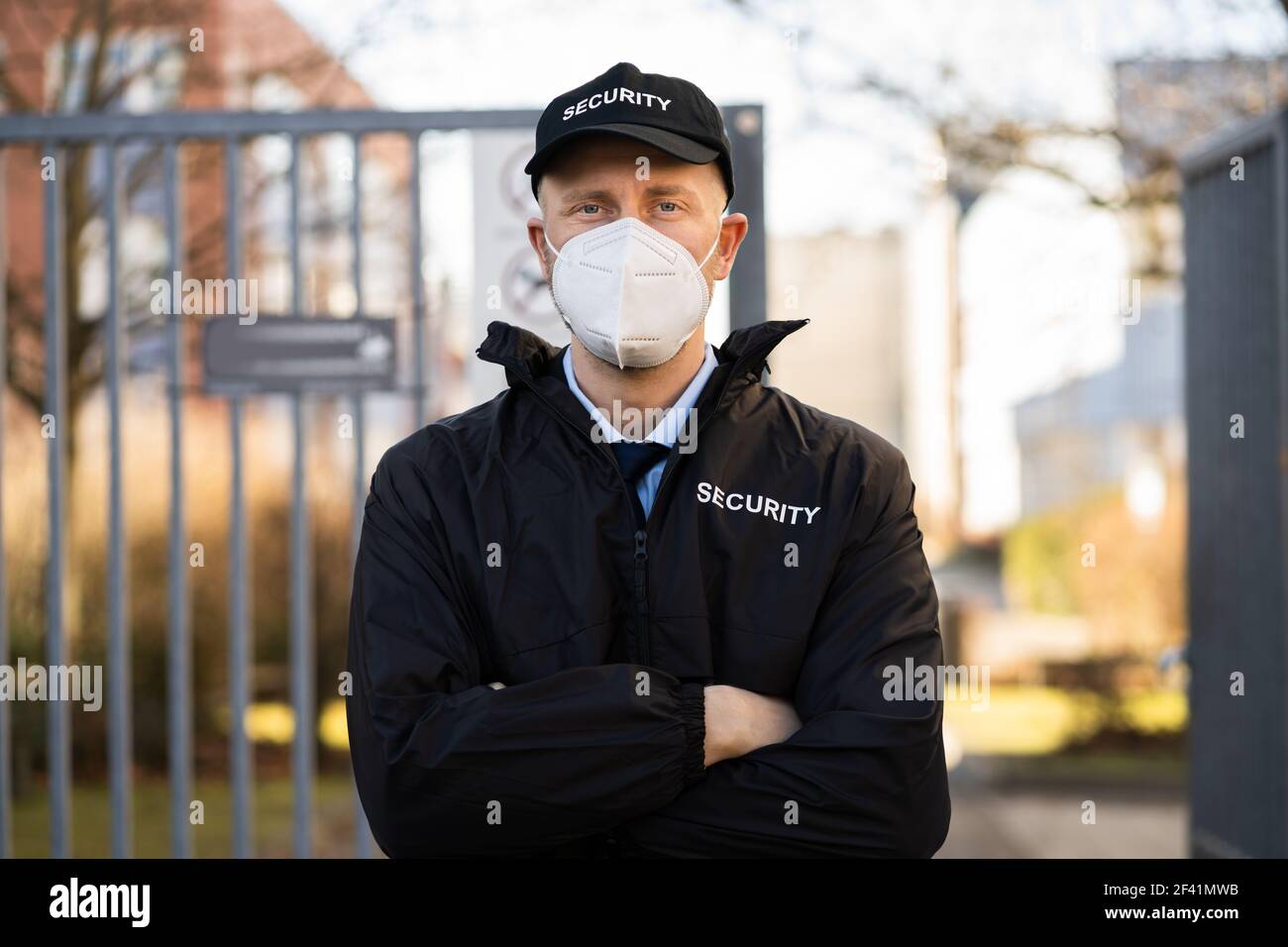 Security guard wearing face mask hi-res stock photography and images ...