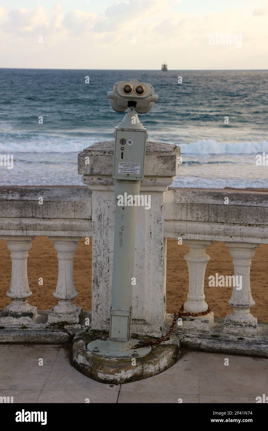 Coin operated metal Tower viewer binoculars on a stalk on the seafront ...