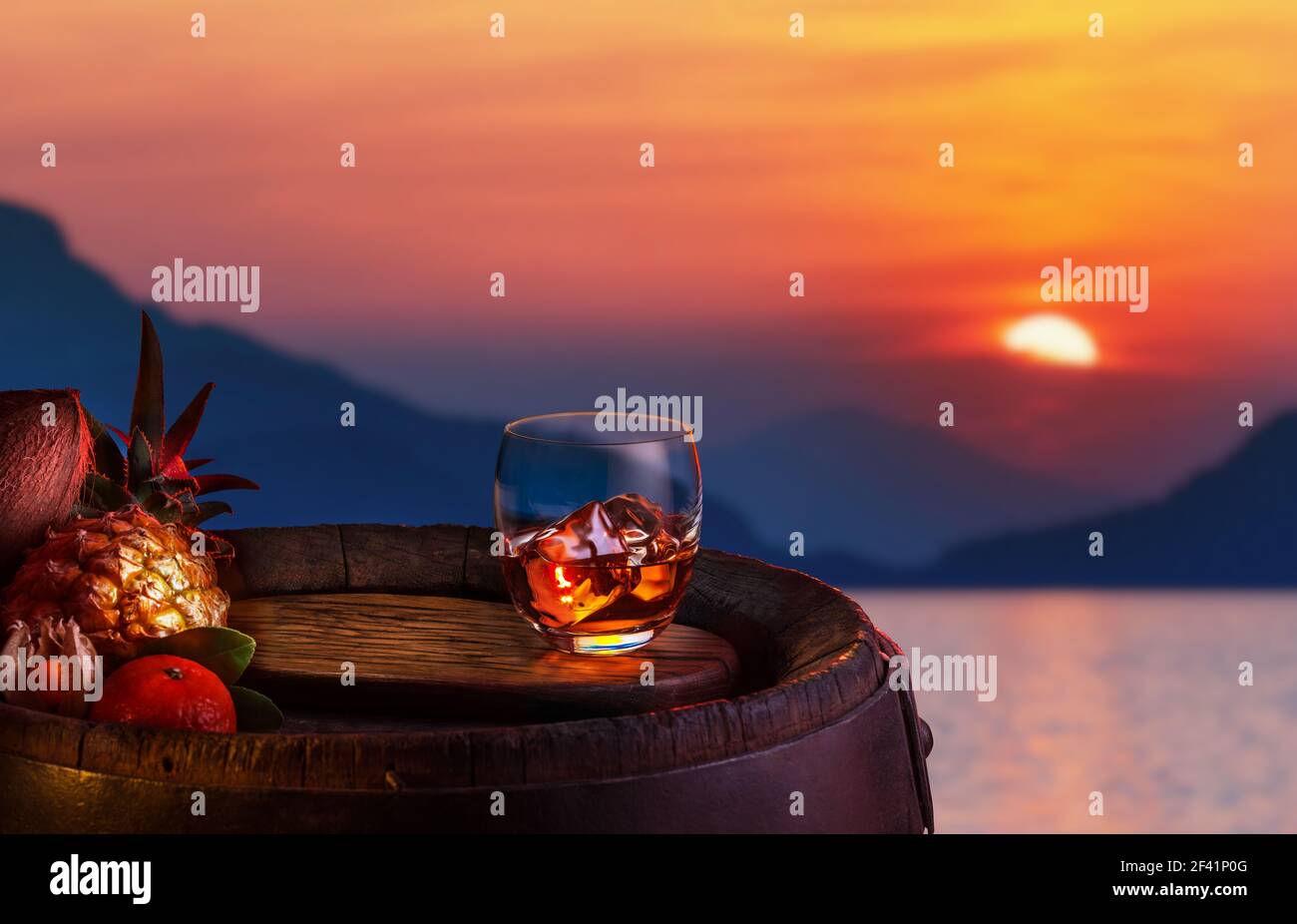 Glass of dark rum sunset hi-res stock photography and images - Alamy