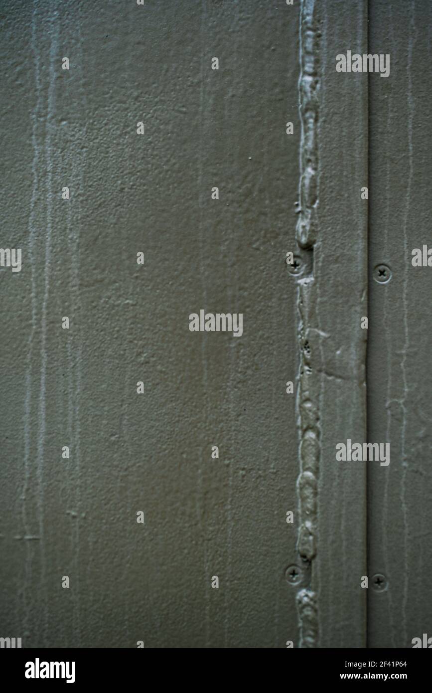 Abstract green industrial metal background texture with bolts and ...