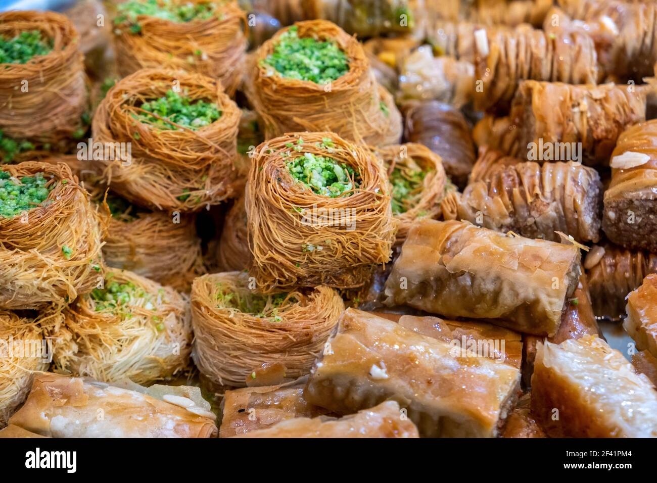 Traditional Mediterranean sweet Baklava delights with crushed pistachio ...