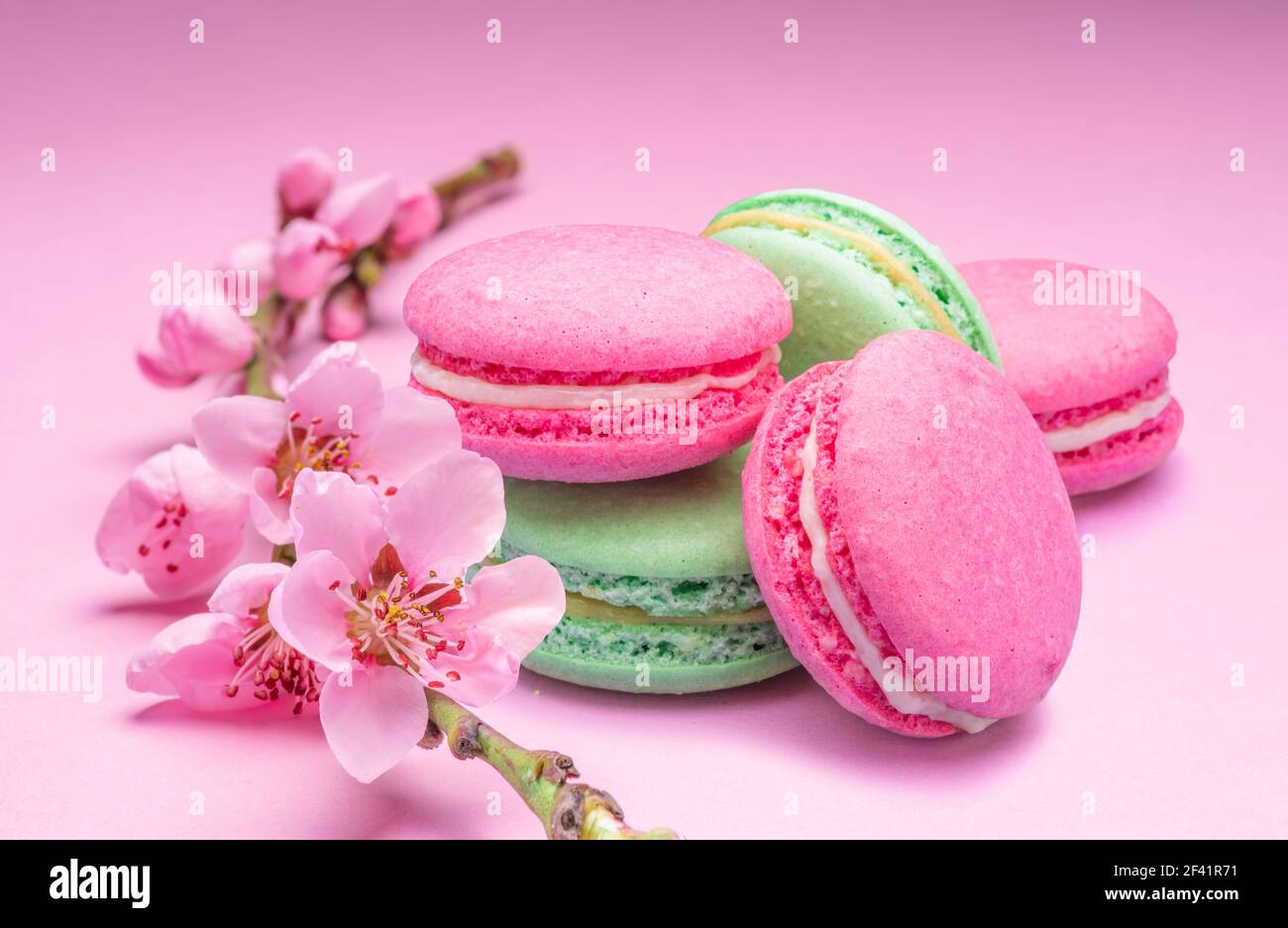 Colorful sweet macarons or macaroons, different flavored cookies on ...