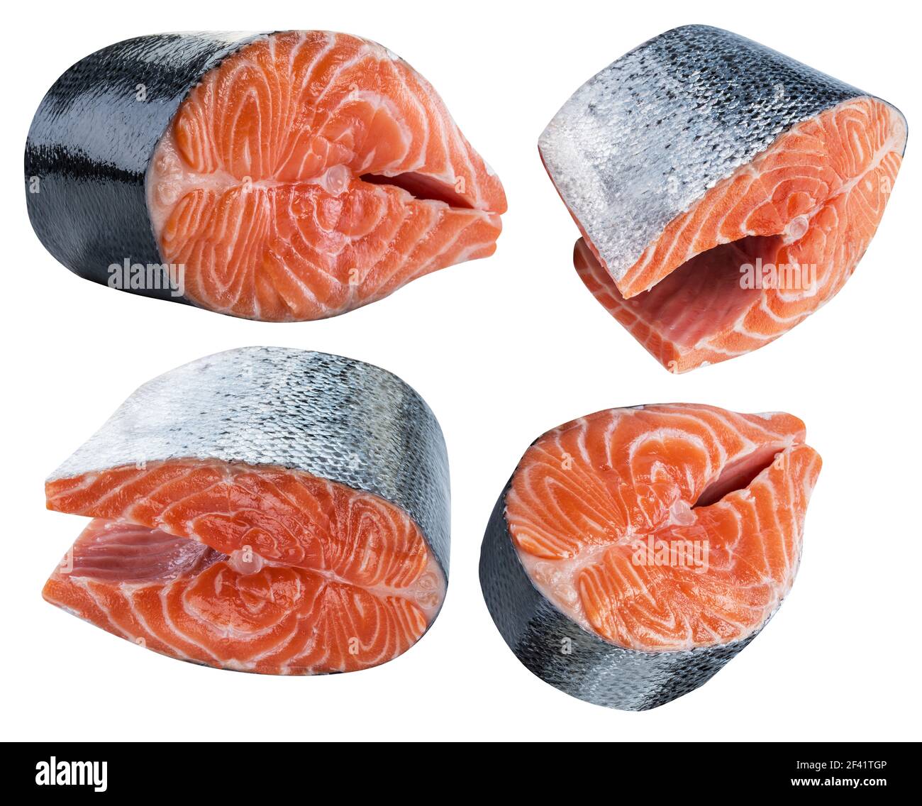 Four cuts of salmon fish isolated on white background. File contains ...