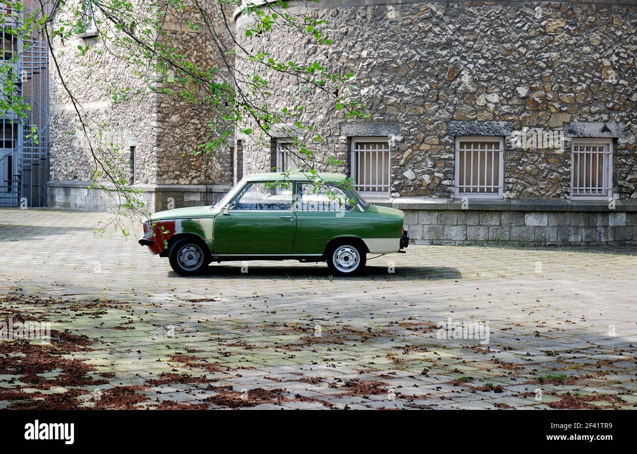 Vintage old green car in a backyard in Netherlands Stock Photo - Alamy