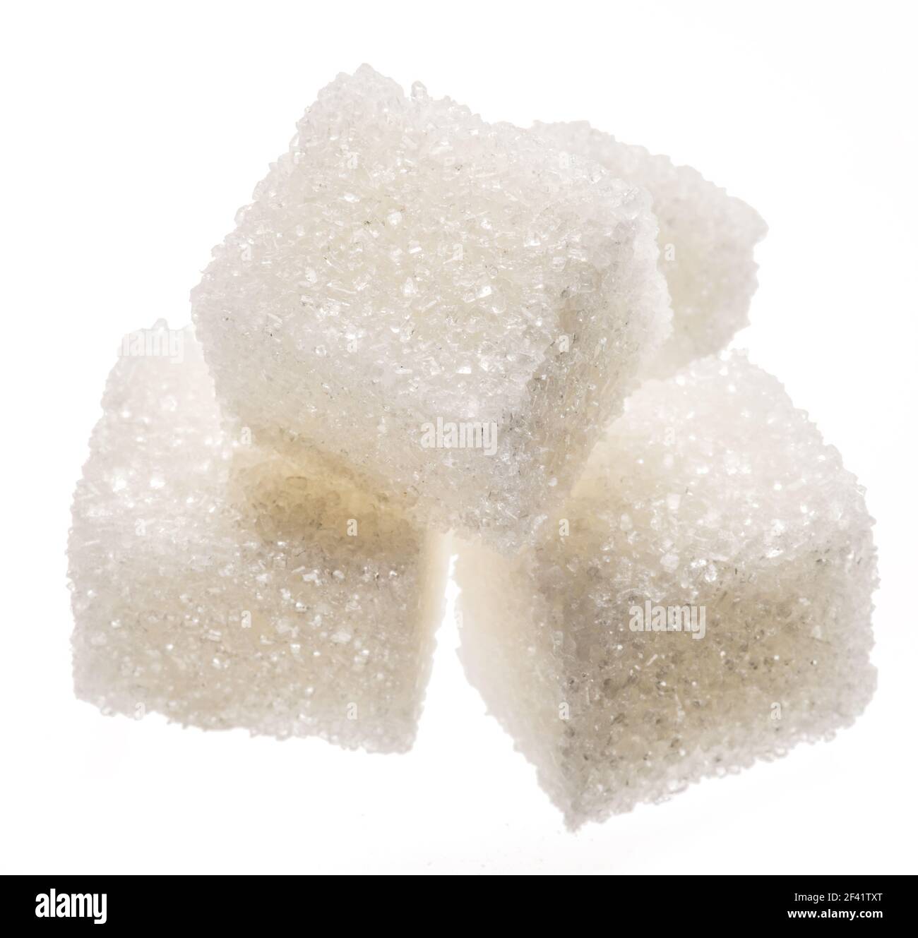 White sugar cubes on white background. Macro picture Stock Photo - Alamy