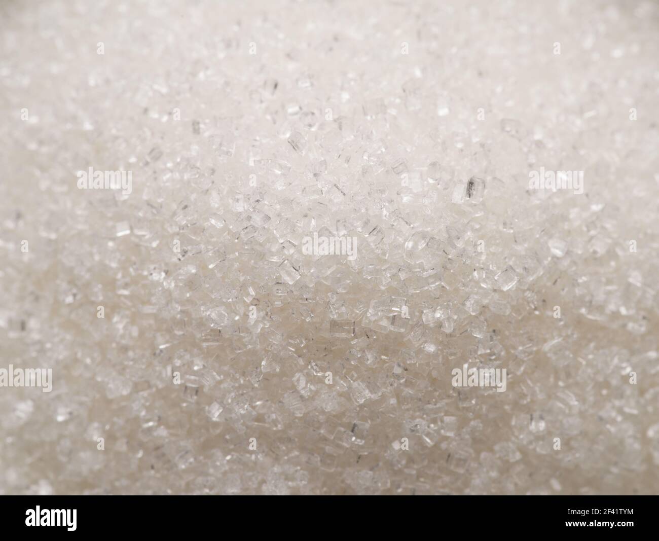 White refined sugar granules close-up. Food background Stock Photo - Alamy