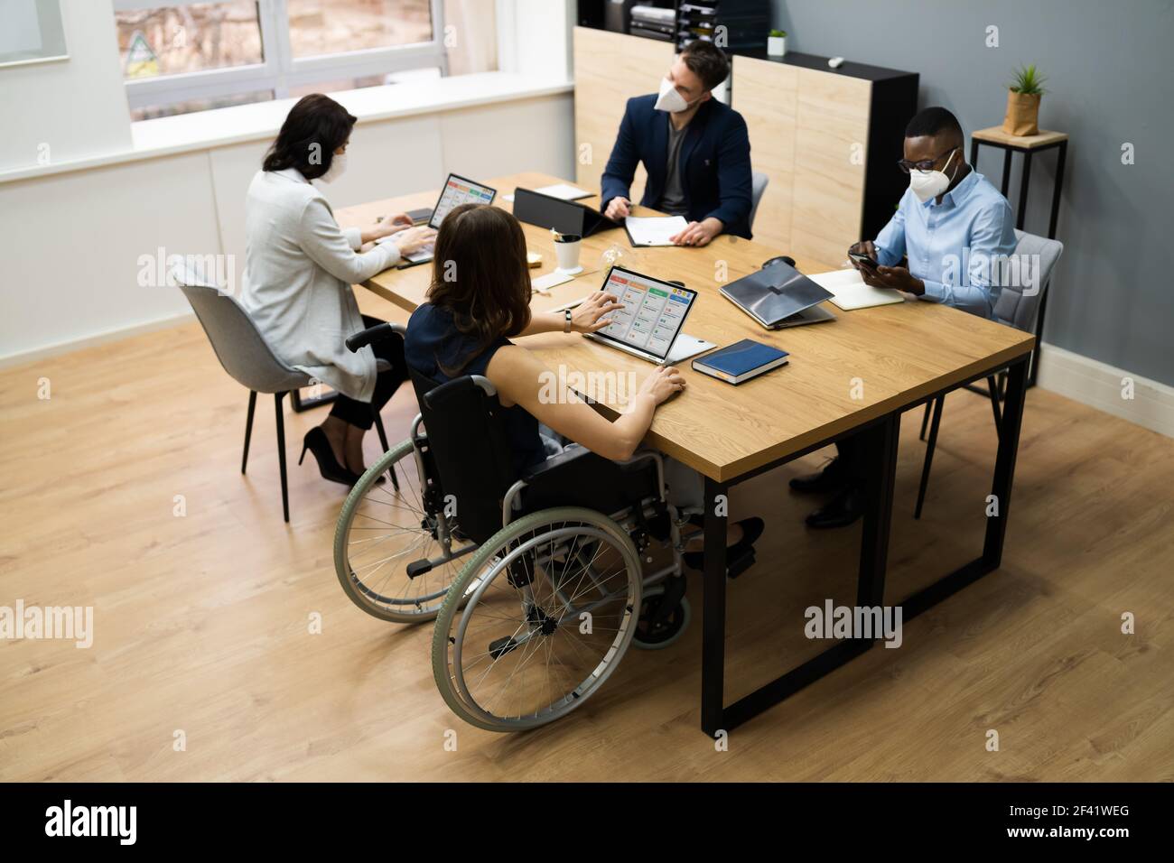 Diverse Disabled Business Worker People In Wheelchair Wearing Face Mask ...