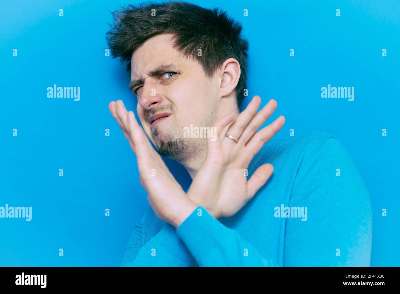 Stop gesture with indignation shown by men Stock Photo - Alamy