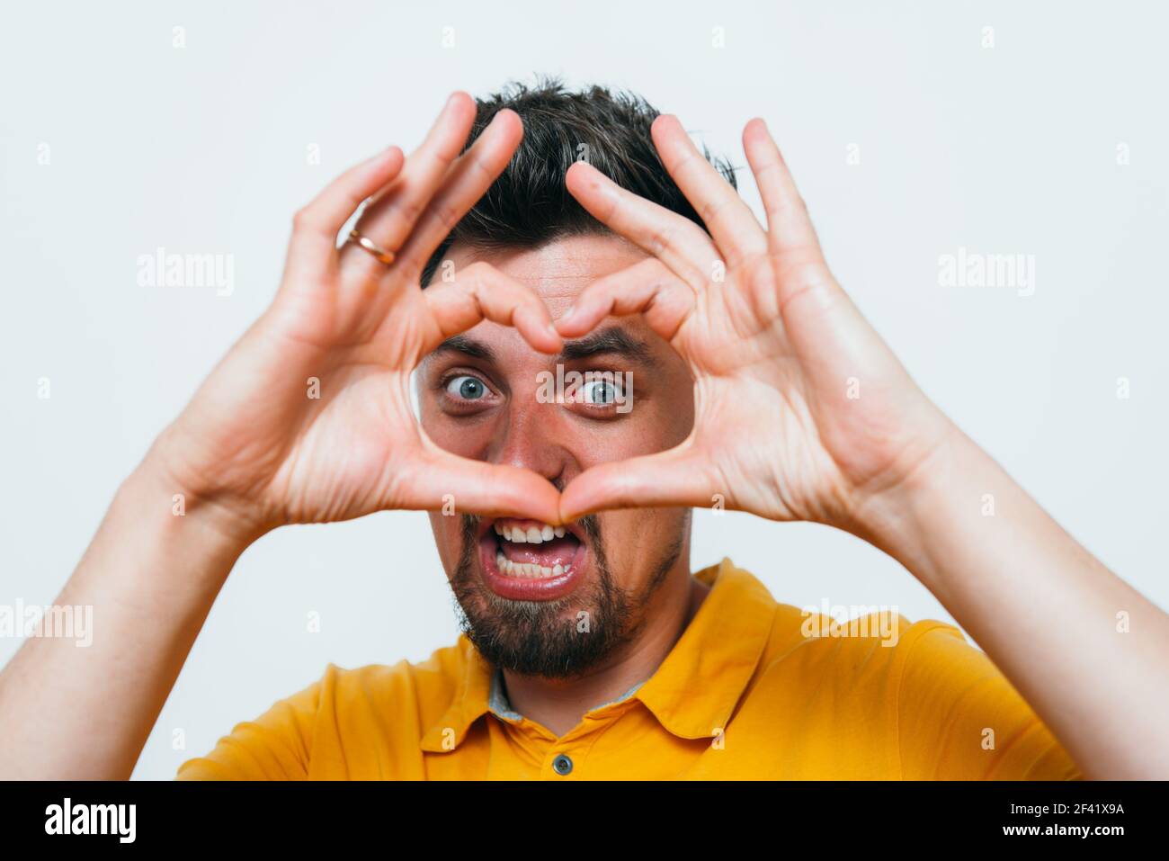 man making a hand heart frame Stock Photo - Alamy