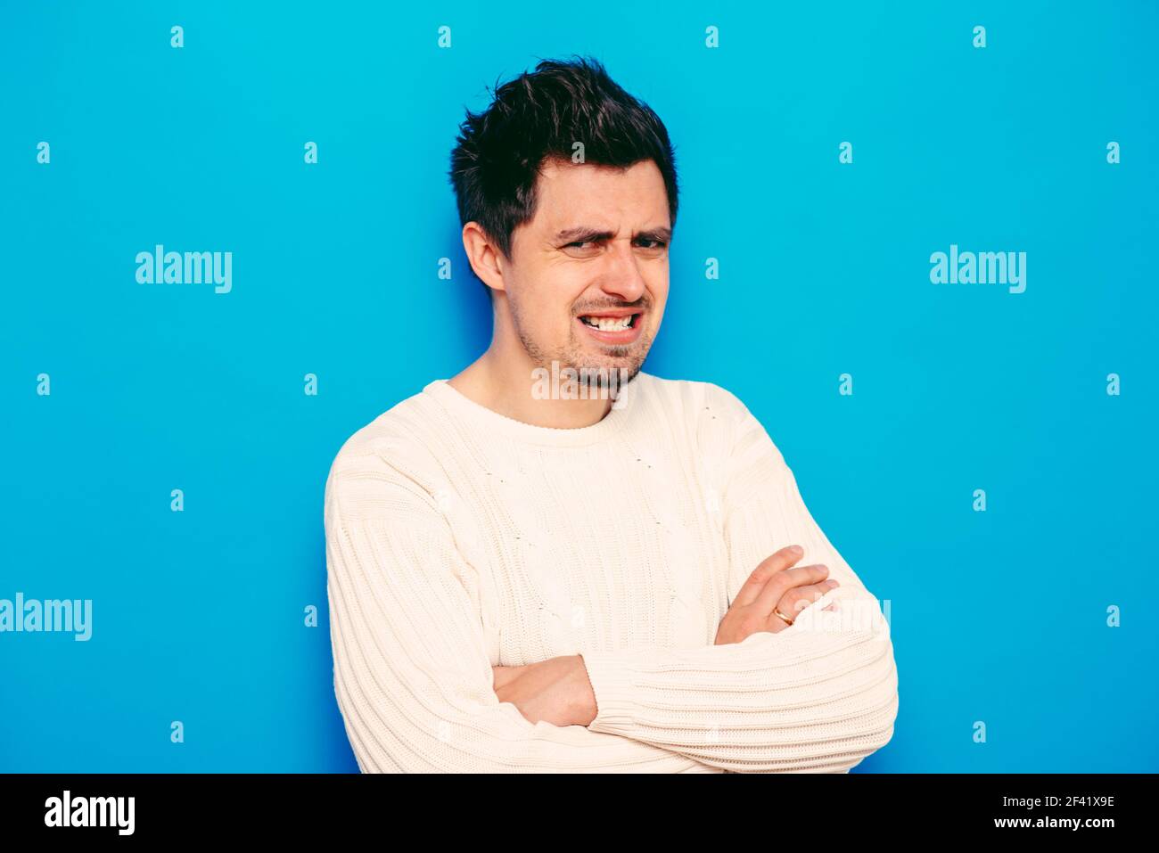 Folded hands young man hi-res stock photography and images - Alamy