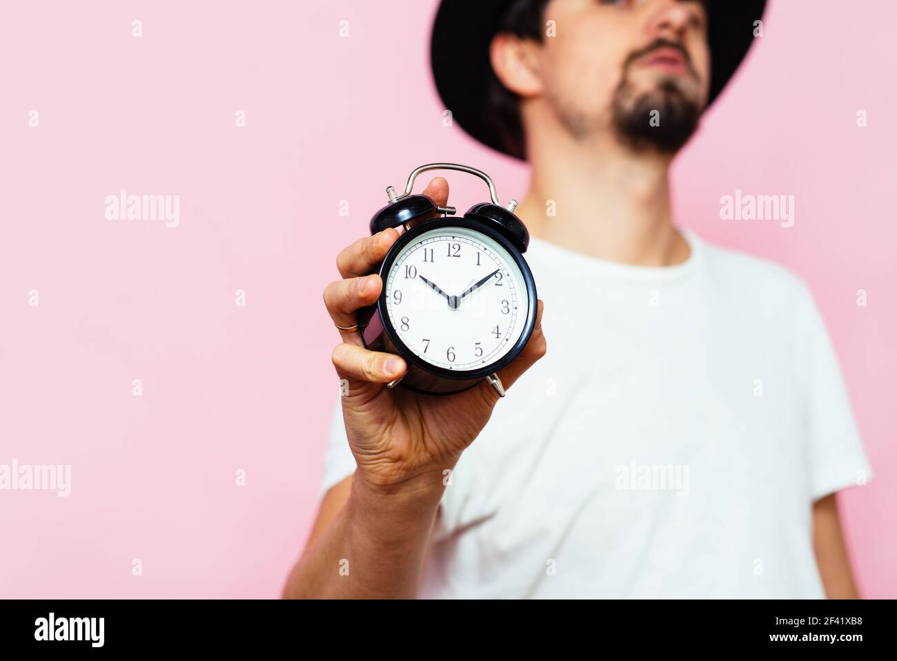 Clock, Man delay Stock Photo - Alamy