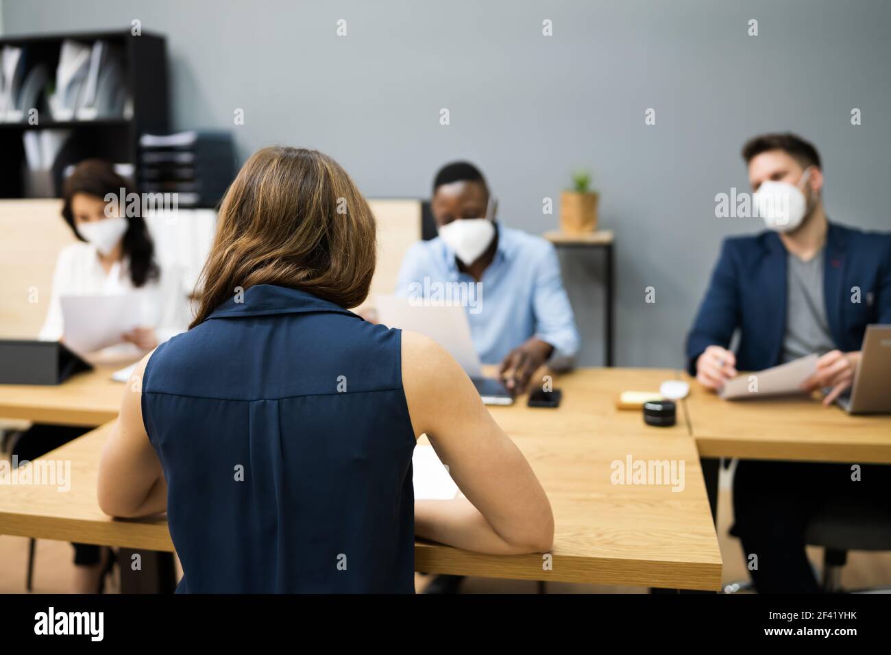 Business Manager Job Interview Talking In Face Mask Stock Photo - Alamy