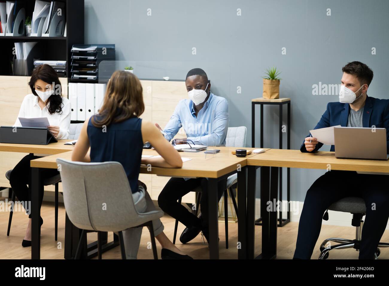 Business Manager Job Interview Talking In Face Mask Stock Photo - Alamy