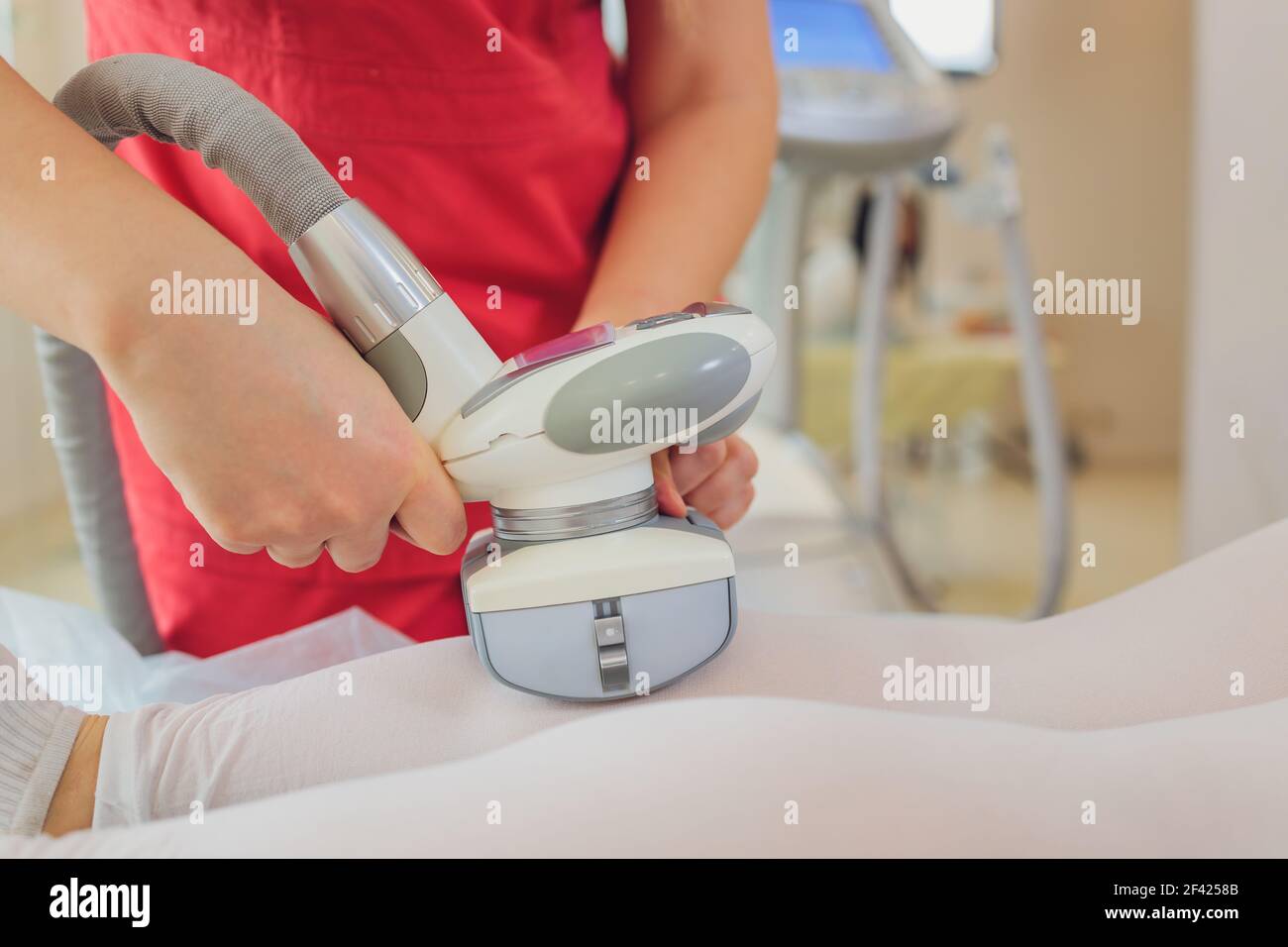 Woman In Special White Suit Getting Anti Cellulite Massage In A Spa