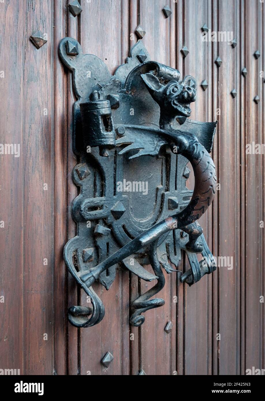 Close-up of an old door handle on an ancient wooden door Stock Photo ...