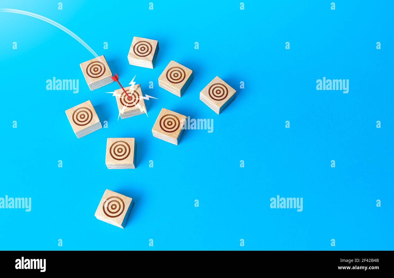 Red bow arrow hits a target circle. Direct shot, Bulls-eye. Marketing ...