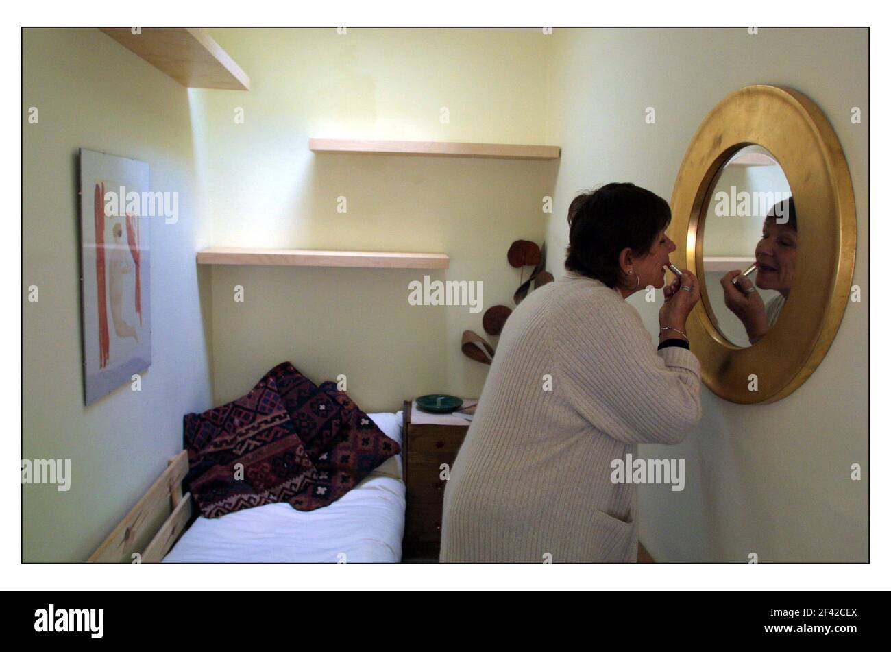 Sue Minns in her TINY flat...Her bed is in all pics showing the size of ...