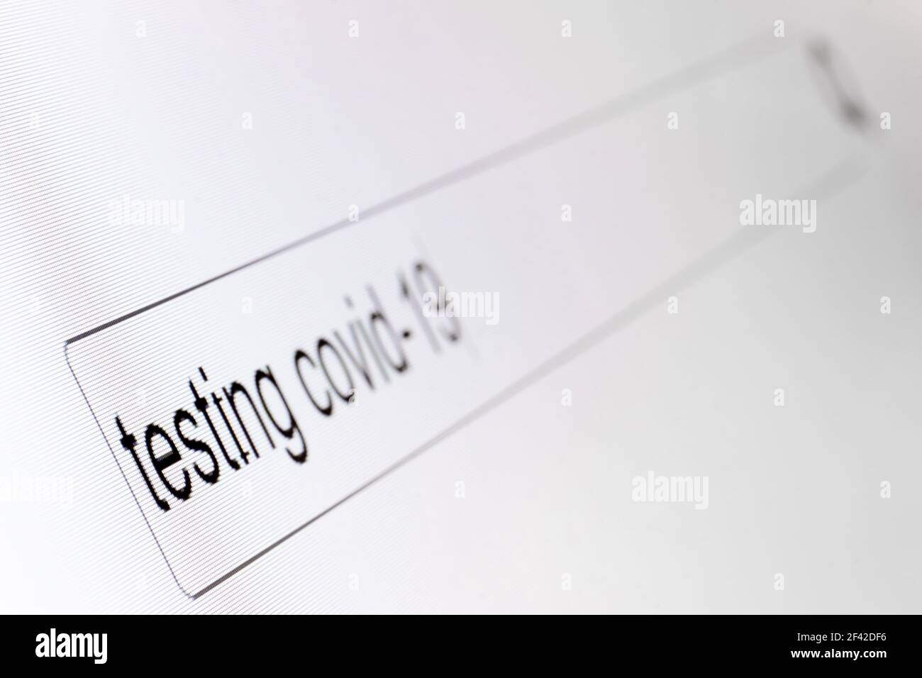 Search bar on a computer monitor with the question Testing covid-19 ...